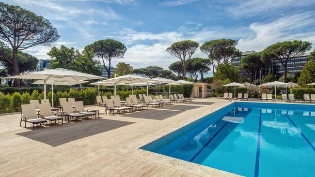 Lush Resort-Style Rome Stay Near the Airport with Outdoor Pool, Bar ...